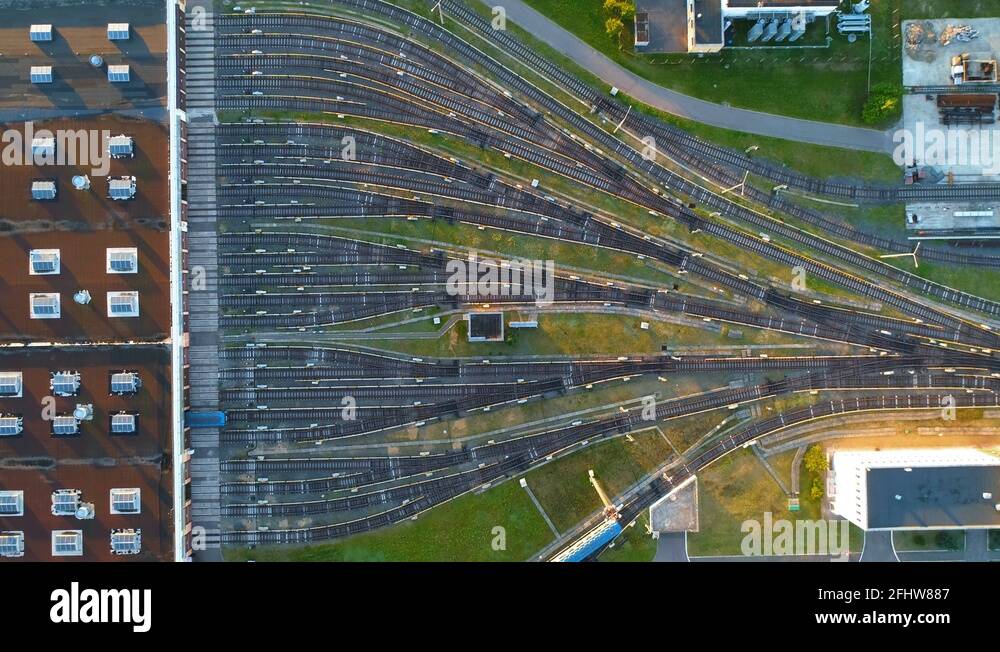 Depot metro, top view of departing passenger subway train from hangar ...