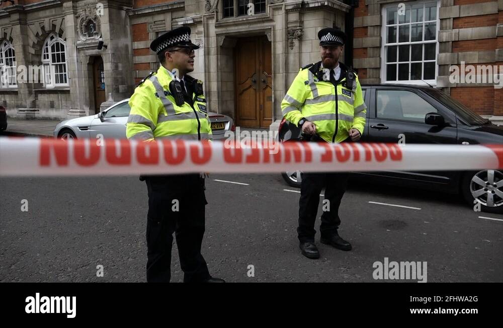 Two police officers talking Stock Videos & Footage - HD and 4K Video ...