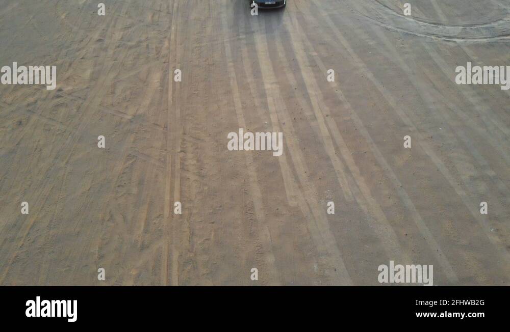 Grey convertible car with open top filmed from above - riding through ...