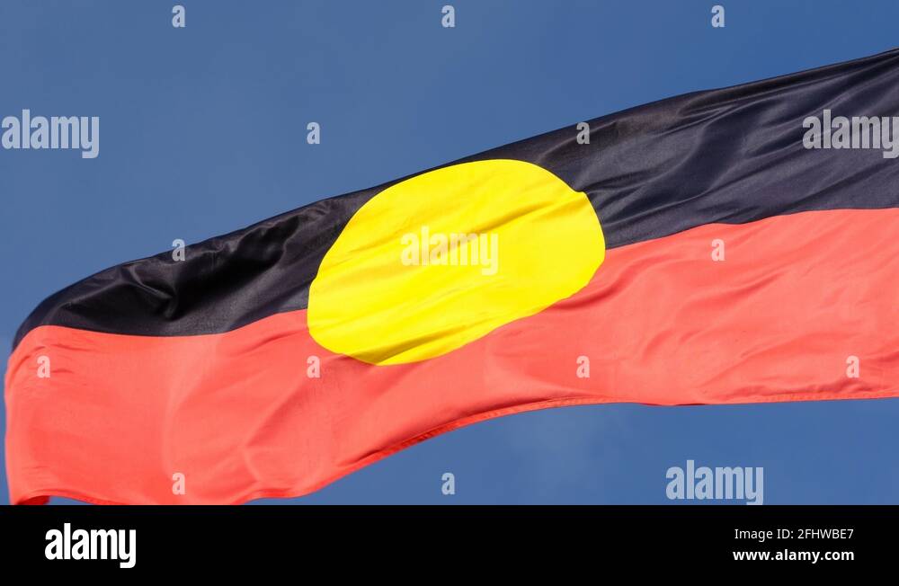 Australian aboriginal Flag flying in the wind Stock Video Footage - Alamy