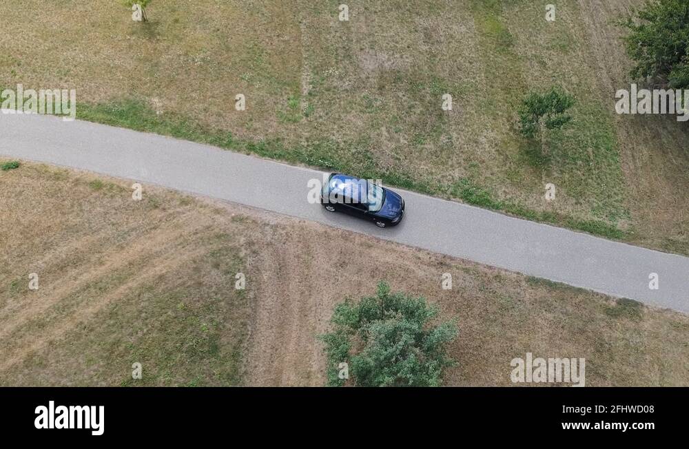 Blue car driving away Stock Videos & Footage - HD and 4K Video Clips ...