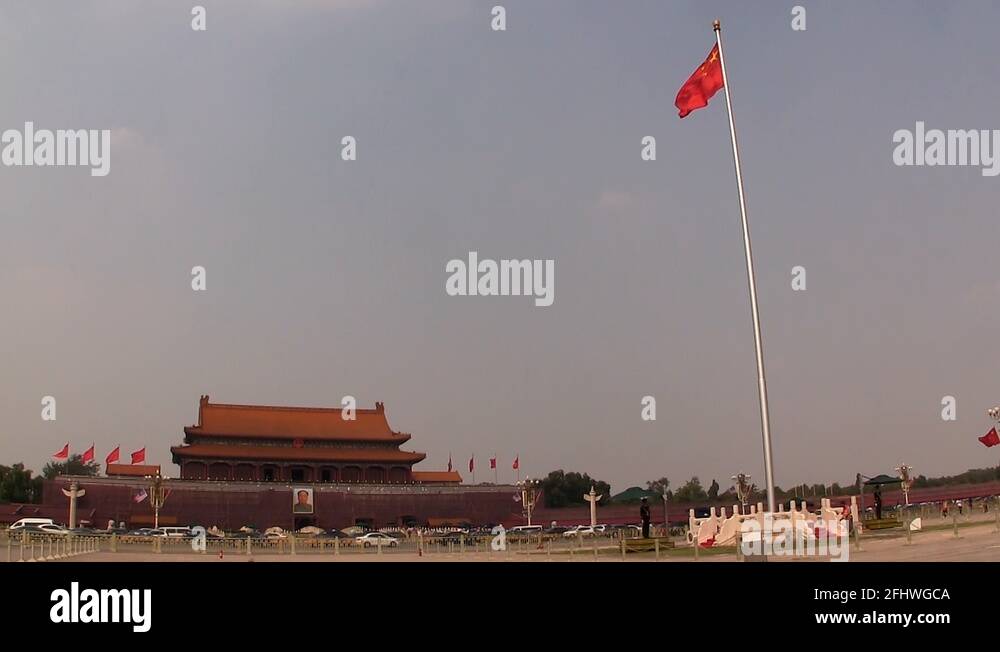Tiananmen Square with chinese flag waving in the wind, Beijing, China ...