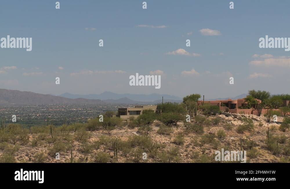 Static shot of ranch-style homes in the desert just outside of Tucson ...