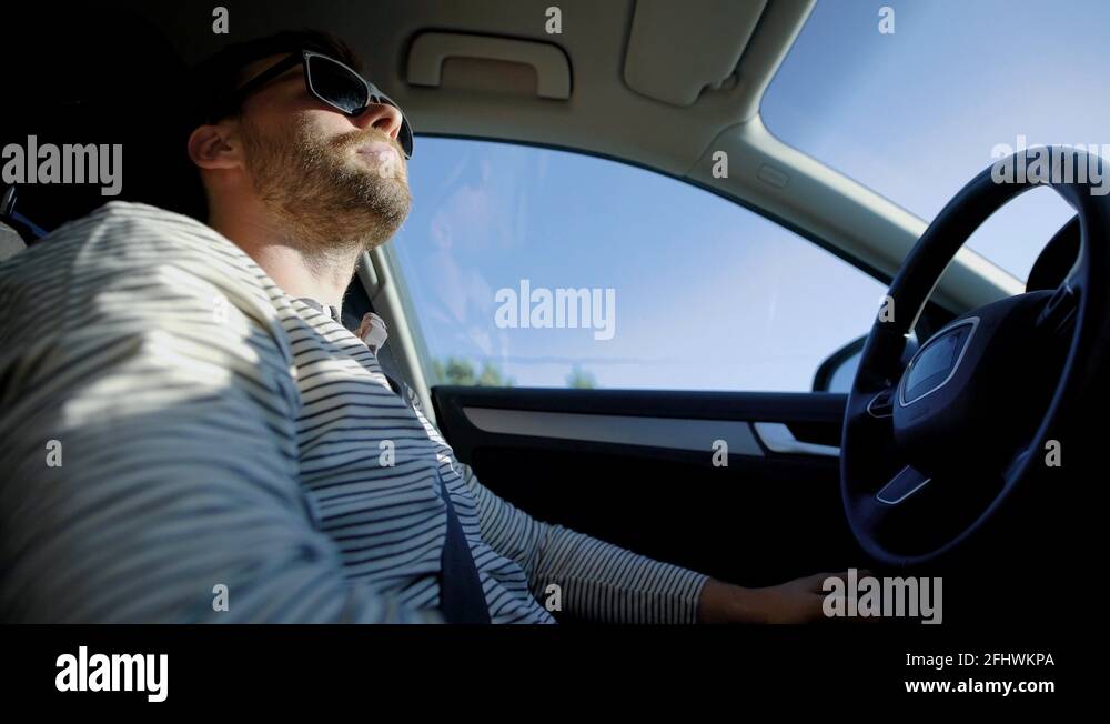 Man sitting in car Stock Videos & Footage - HD and 4K Video Clips - Alamy