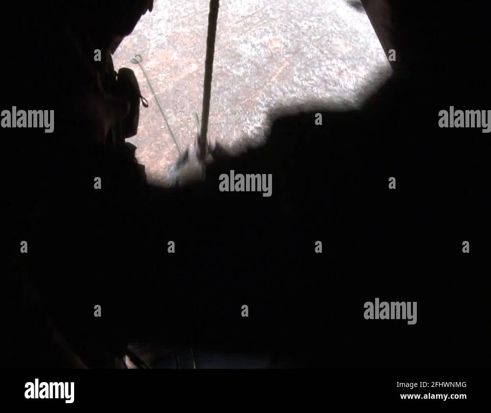 Spanish special forces personnel fast roping from chinook helicopter ...