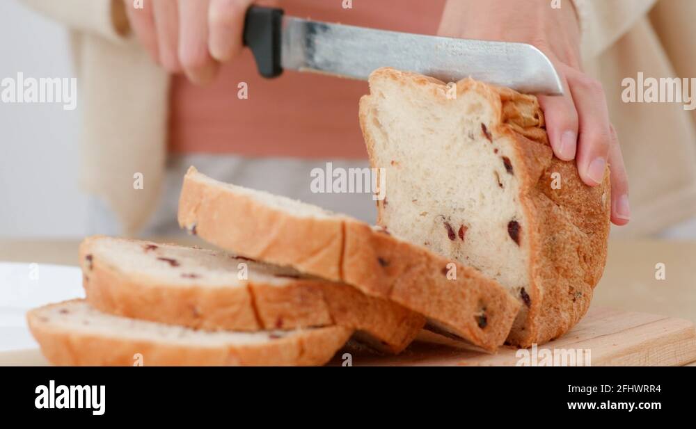 Cutting bread Stock Videos & Footage - HD and 4K Video Clips - Alamy