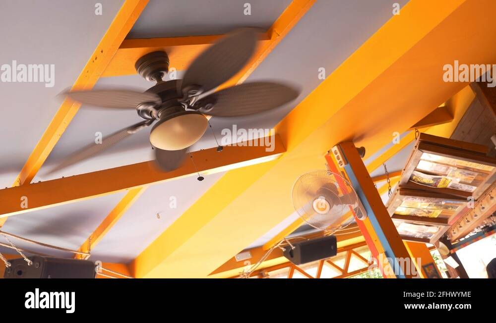 A cooling ceiling fan in a bar Stock Video Footage - Alamy