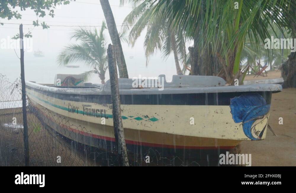 Rain and boat beach Stock Videos & Footage - HD and 4K Video Clips - Alamy