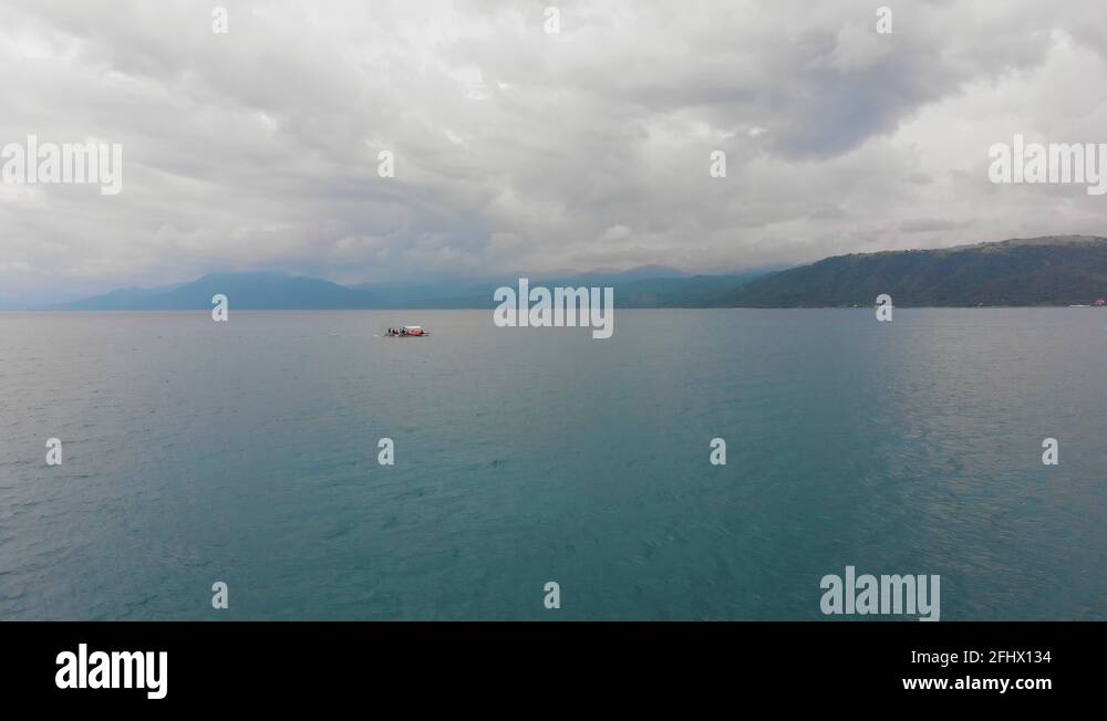 Beautiful cinematic circling drone shot rotating around aing Philippine ...