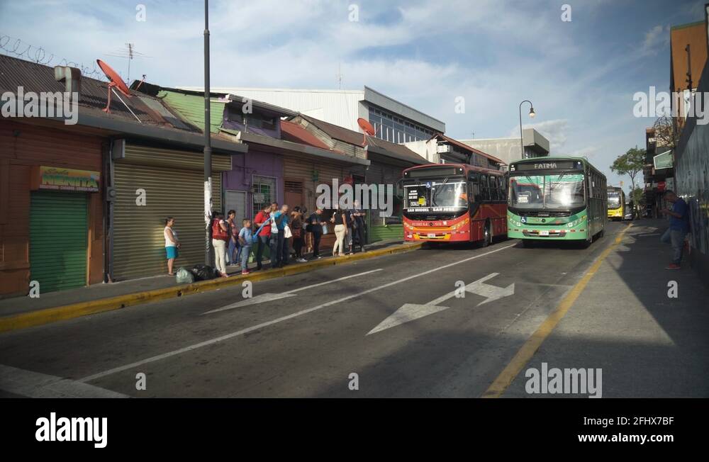People waiting for their bus at a bus station in a South America ...