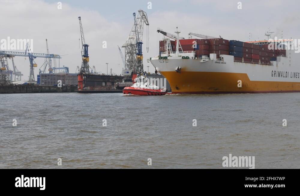 RORO vessel Grande Abidjan arrives in Hamburg Harbor at cloudy day ...