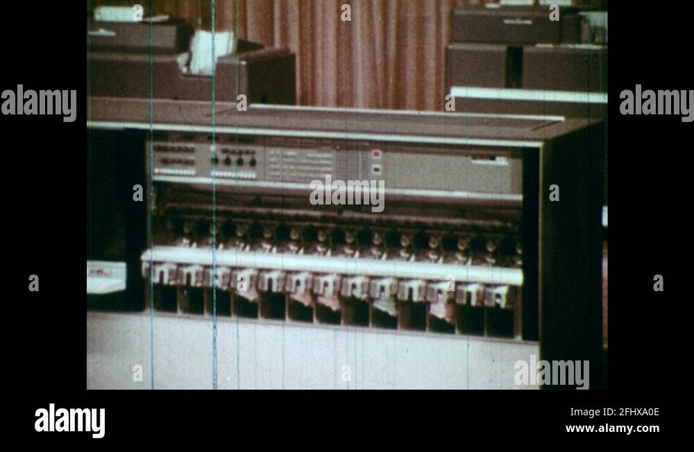 1960s: Cards run swiftly through sorting computer. Death certificate ...