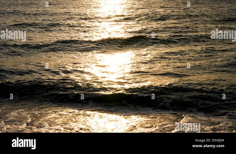 Reflection of sun rays in the sea water Stock Video Footage - Alamy