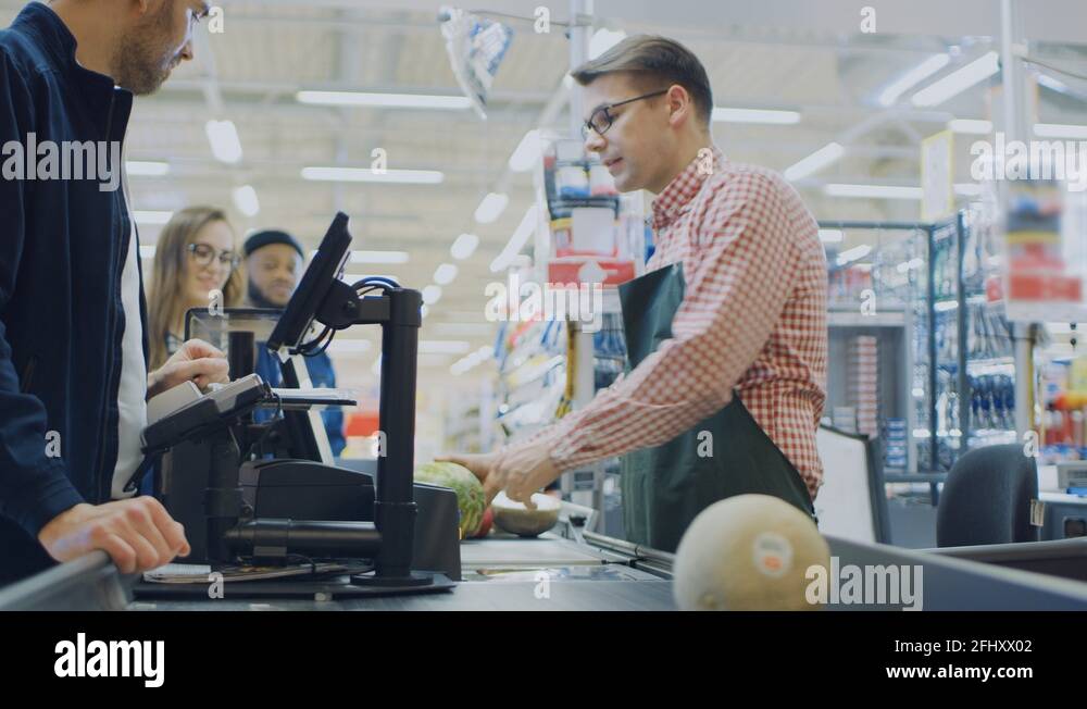 At the Supermarket: Checkout Counter Happy Customer Chats with Friendly ...