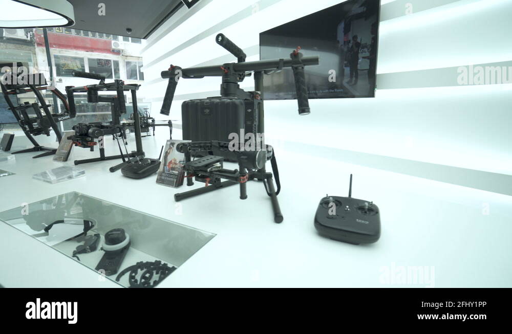 flagship DJI store in HK. Showcases with gimbals, stabilizers Stock ...
