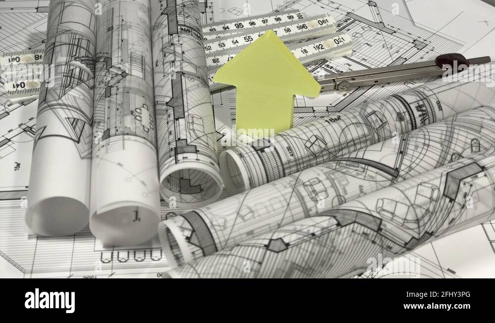 Blueprints - rolls of architectural drawings, yardstick - folding ruler ...