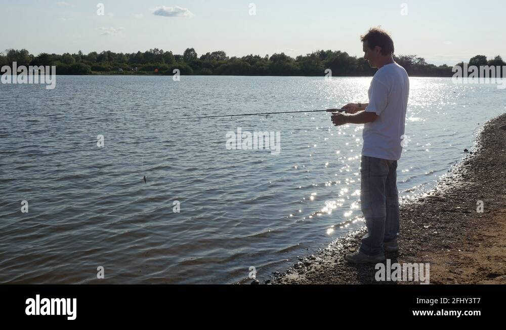 Angler catching fish on river Stock Videos & Footage - HD and 4K Video ...