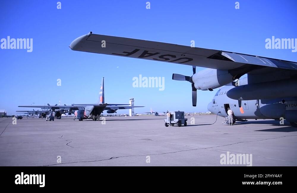 Aircrew member refuel Lockheed C-130 Hercules on runway - 2018 Stock ...
