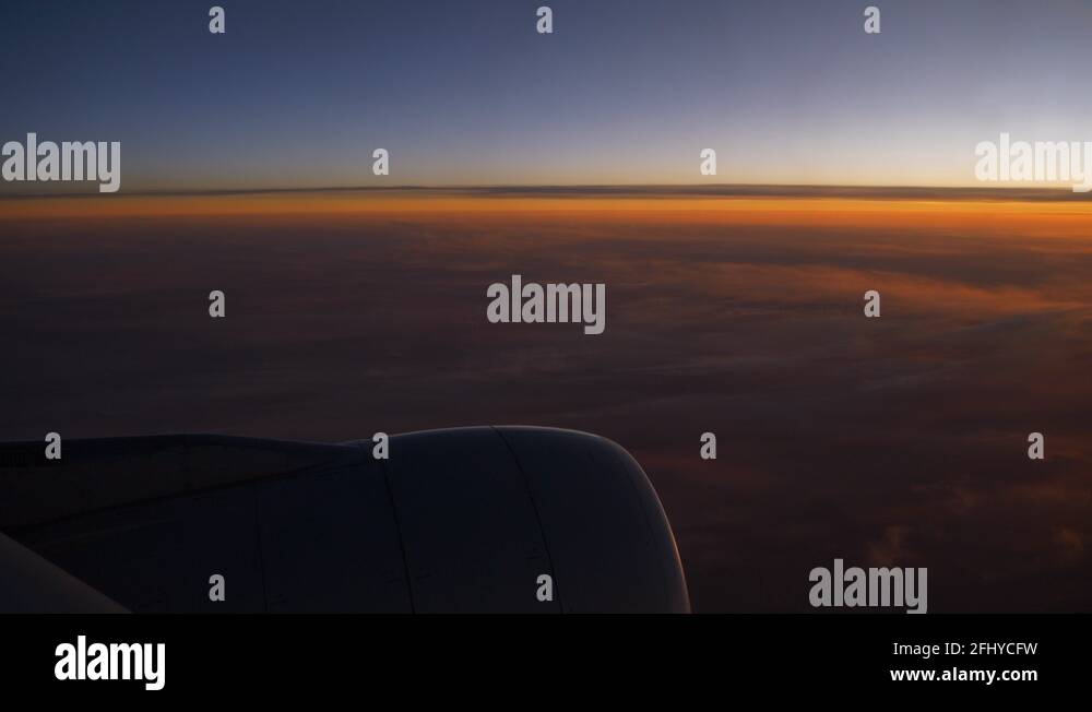 sunset sky airplane window seat view on engine 4k china Stock Video ...