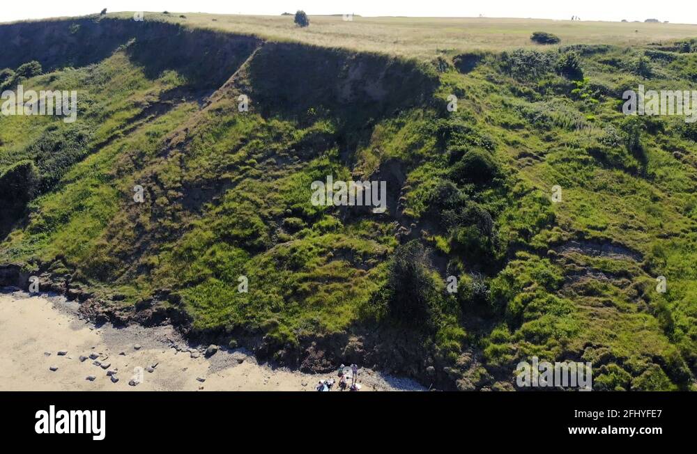 DJI Drone Filey Beach Cliff Level Stock Video Footage - Alamy