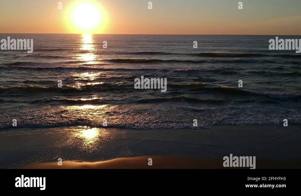 Sunrise at beach Stock Videos & Footage - HD and 4K Video Clips - Alamy