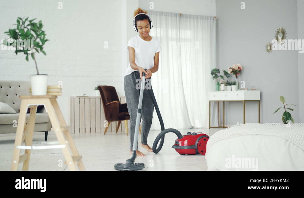 Housewife using vacuum cleaner clean Stock Videos & Footage - HD and 4K ...