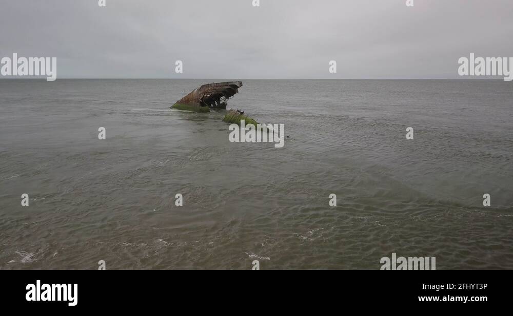 Ship wreckage of the SS Atlantus with some birds on it. The Atlantus ...