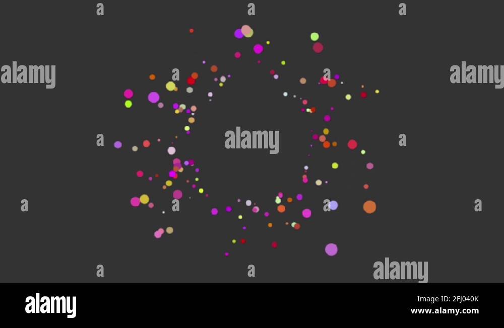 Animated spinning multi color particles Stock Video Footage - Alamy