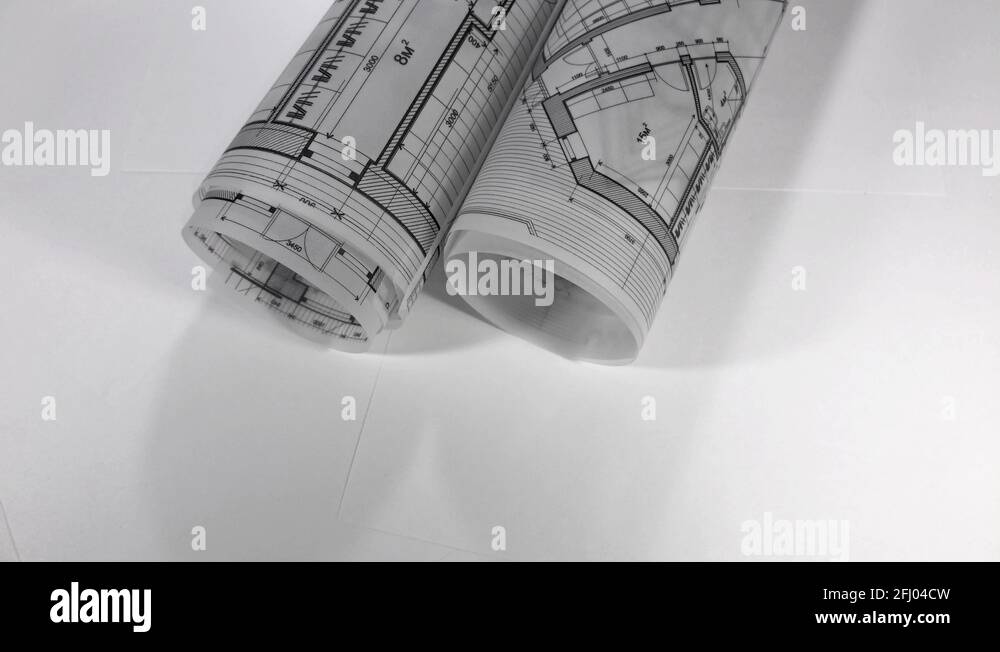 Blueprints - architectural drawings rolls smoothly rotate on the white ...