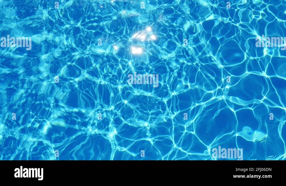 Amazing swimming pool shimmering with its bright see-through sky blue ...