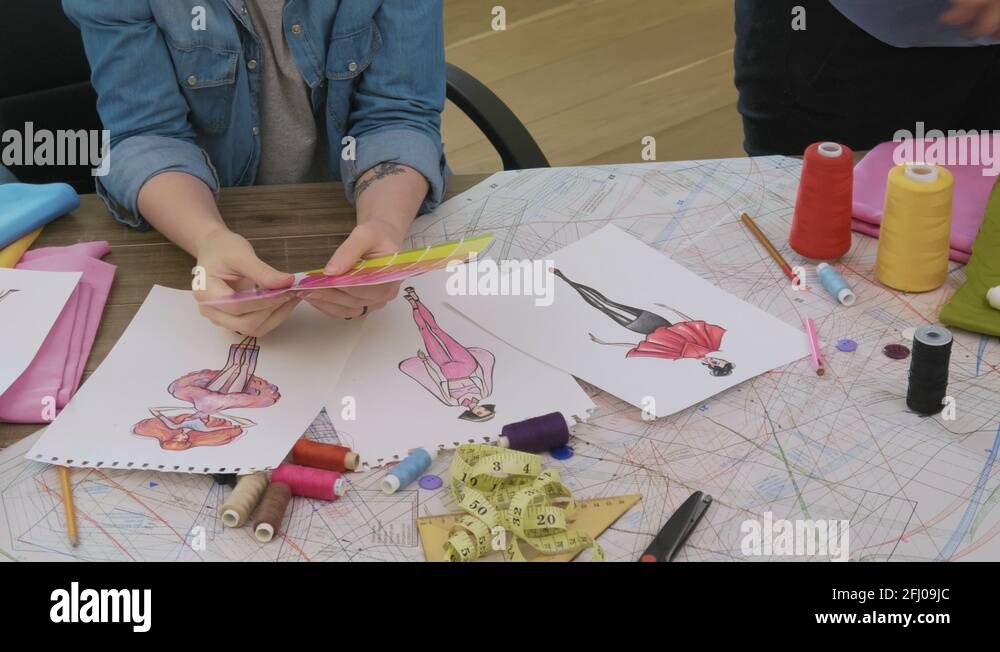 Fashion designers choosing color palette for new dress design Stock ...