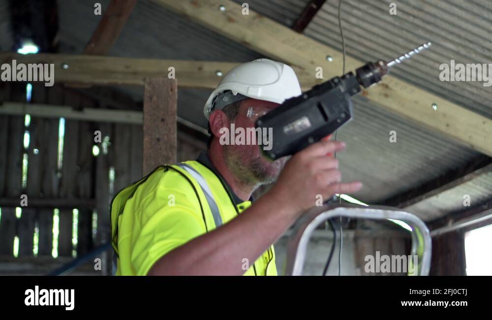 Construction Worker Undertakes Property Development Work In Progress 4K ...