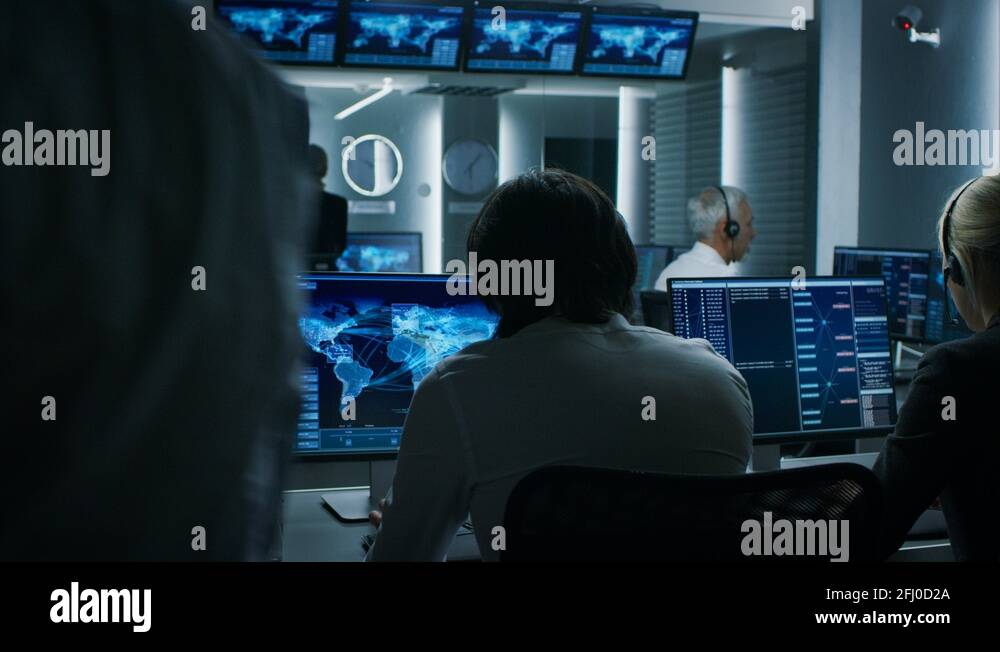Back View of the Cyber Security Dispatchers Working on Personal ...
