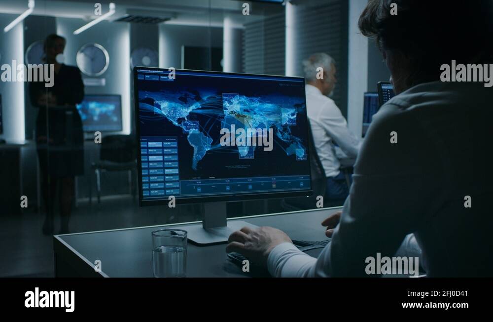 Back View of the Cyber Security Dispatchers Working on Personal ...