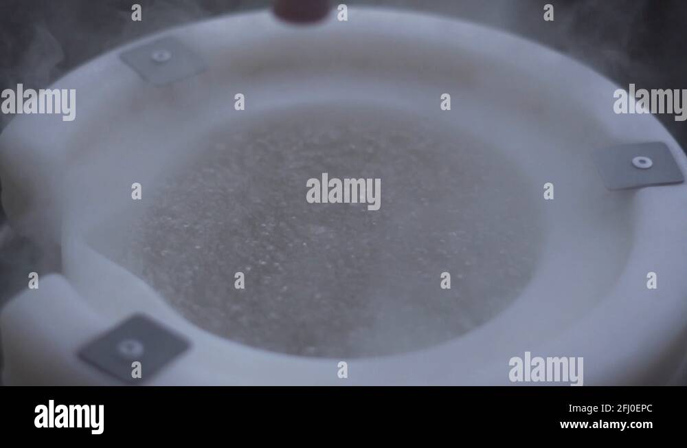HD Slow Motion Footage of liquid Nitrogen Bubbling in Open Top ...
