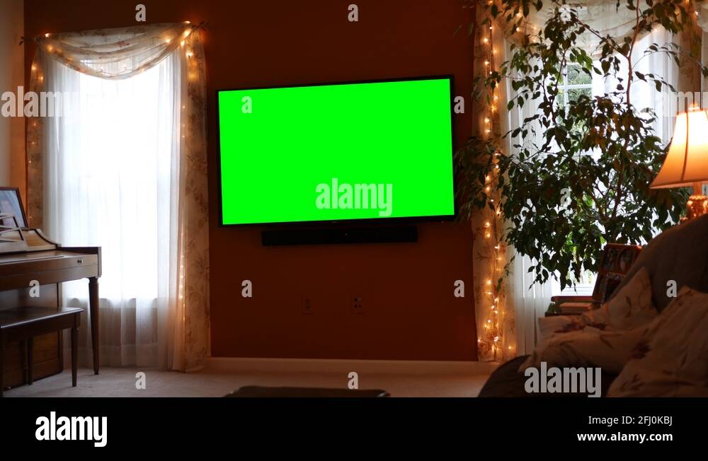 A Green Screen TV in a modern home living room Stock Video Footage - Alamy