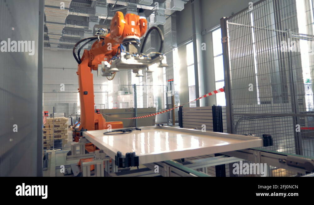 Modern factory robotic arm working at a plant. 4K Stock Video Footage ...