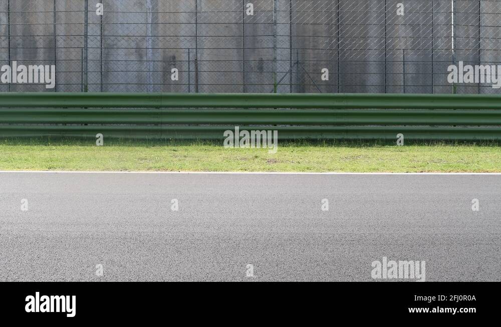 Racing cars on track side view Stock Video Footage - Alamy