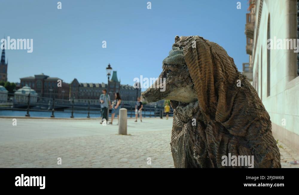 Stockholm, Sweden, July 2018: Sculpture of a homeless fox in the center ...