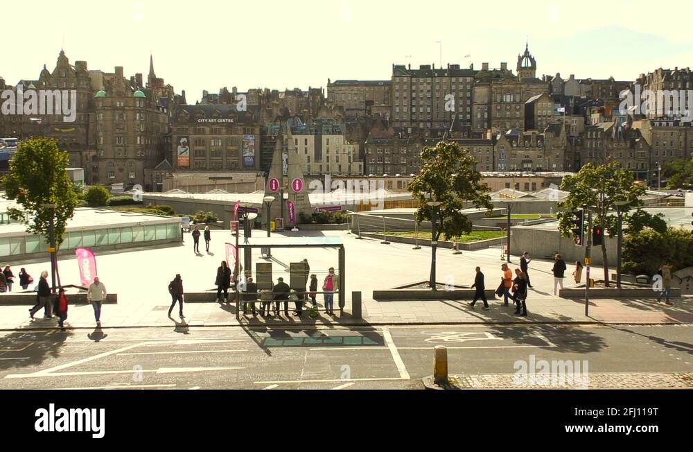 Edinburgh busy city centre, iconic skyline Stock Video Footage - Alamy