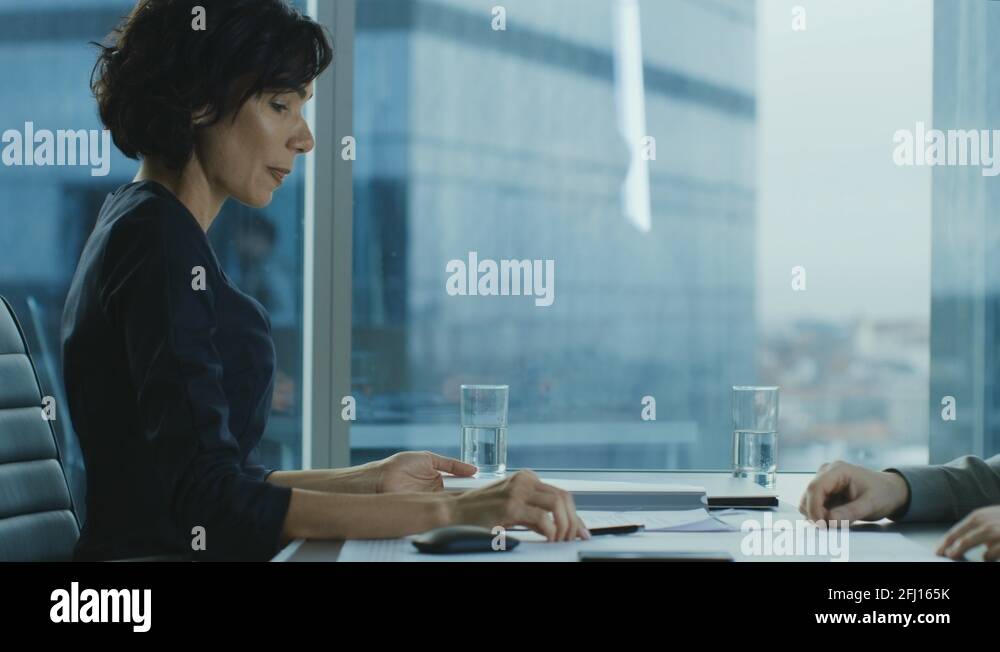 Female executive sitting Stock Videos & Footage - HD and 4K Video Clips ...