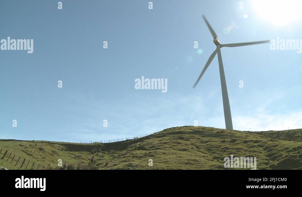 rotating wind turbine and shadow Stock Video Footage - Alamy