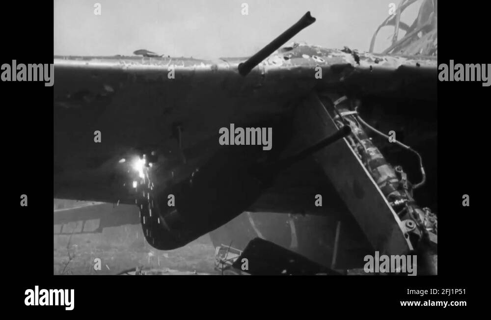 WW2 1945 - Destroyed fighter burning on Tokuno airfield Stock Video ...