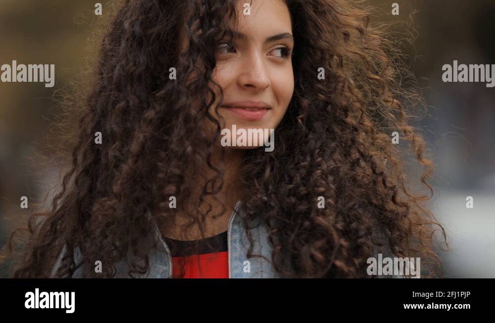 Curly model Stock Videos & Footage - HD and 4K Video Clips - Alamy