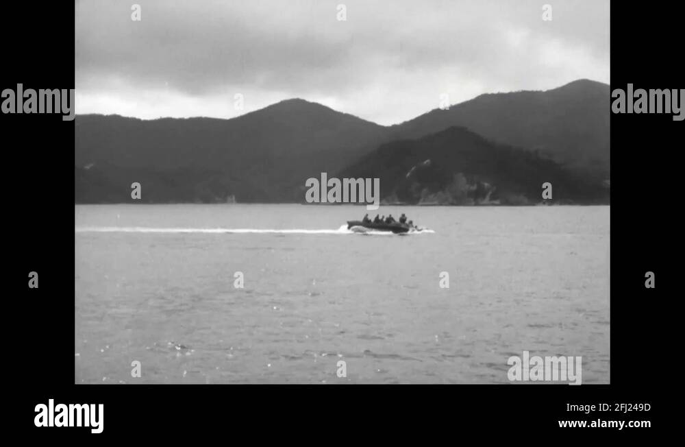 WW2 1945 - US amphibious vehicle swim along japanese coast Stock Video ...