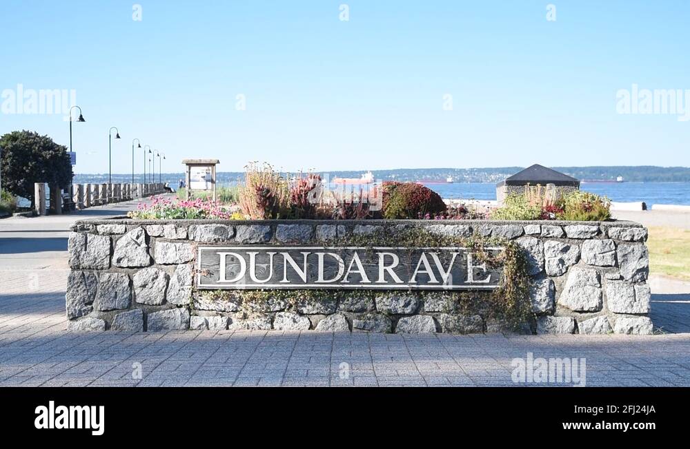 The Dundarave sign at the iconic beach location with ocean background ...