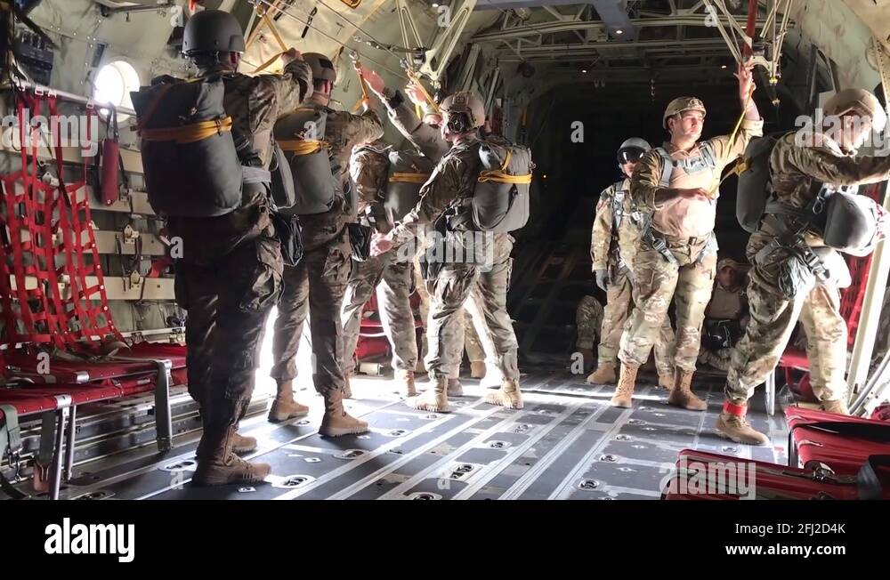 Army soldiers conduct a static line jump from Lockheed C-130 Hercules ...