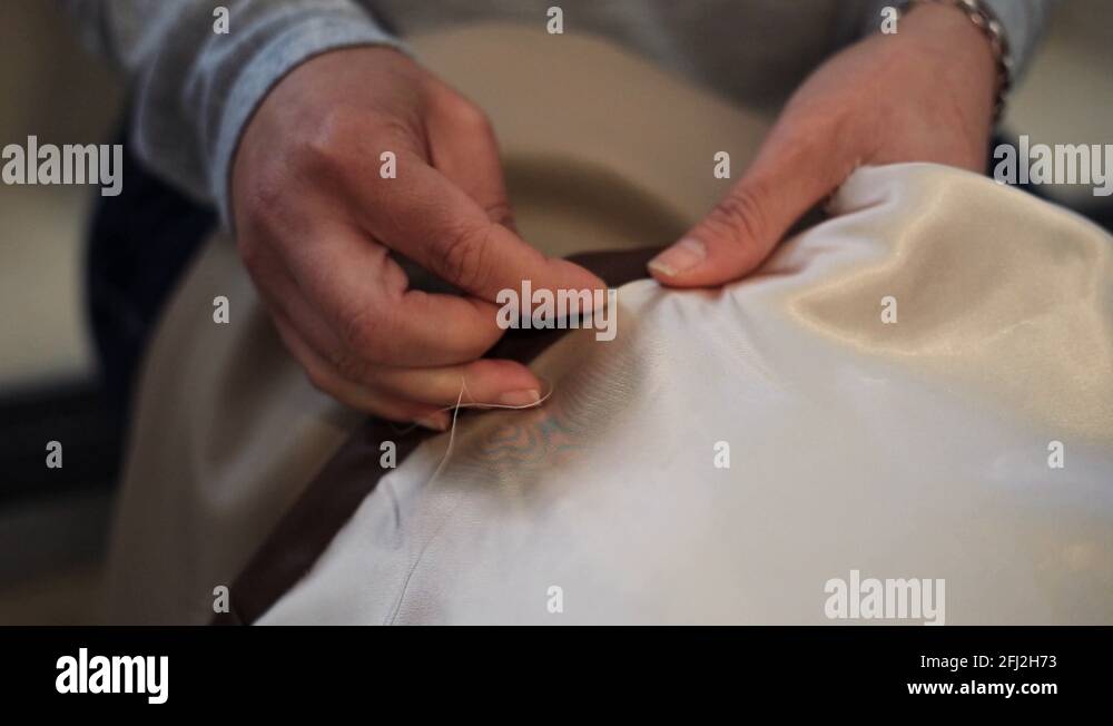 Garment needle Stock Videos & Footage - HD and 4K Video Clips - Alamy