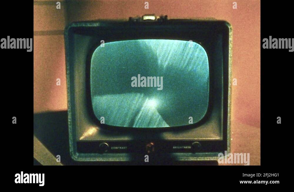 1960s: UNITED STATES: scientist sets brass pin up on electron ...