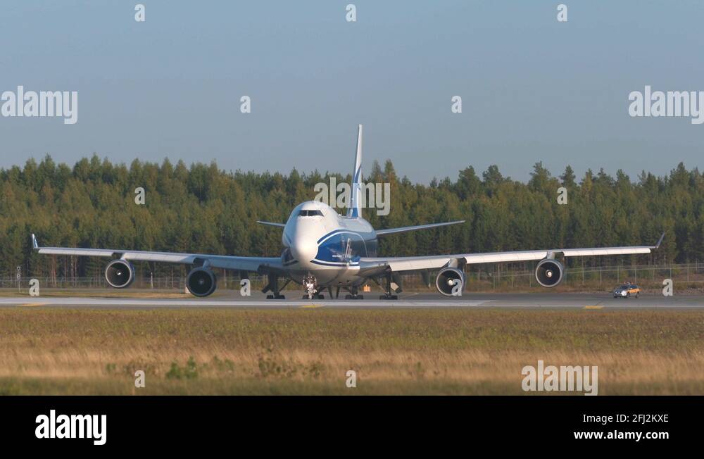 747 cargo airplane front view waiting for takeoff clearance Stock Video ...